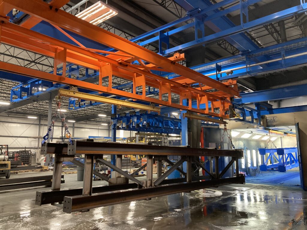 Engineering of custom overhead conveyor systems - IntelliTrak
